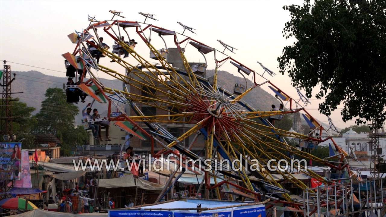 Enjoy rides like ferris wheel, columbus and helicopter at Pushkar Mela ...