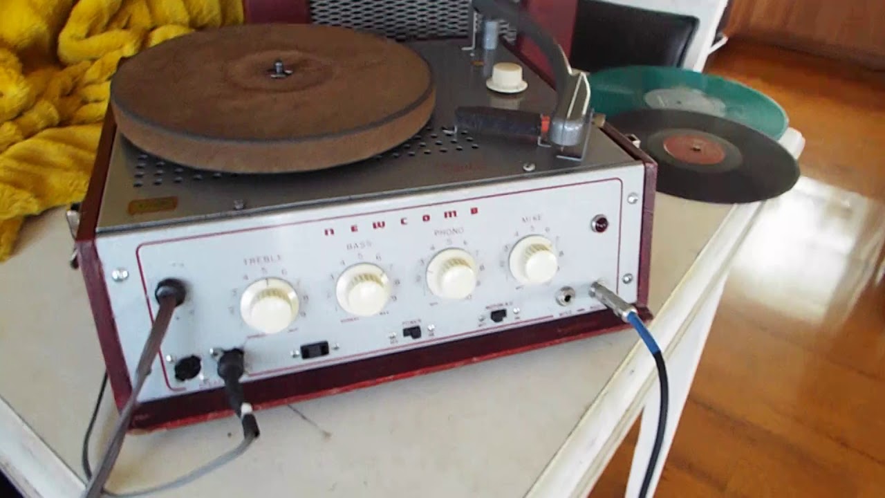 Newcomb TR-16 portable record player playing a guitar TUBE amplifier ...