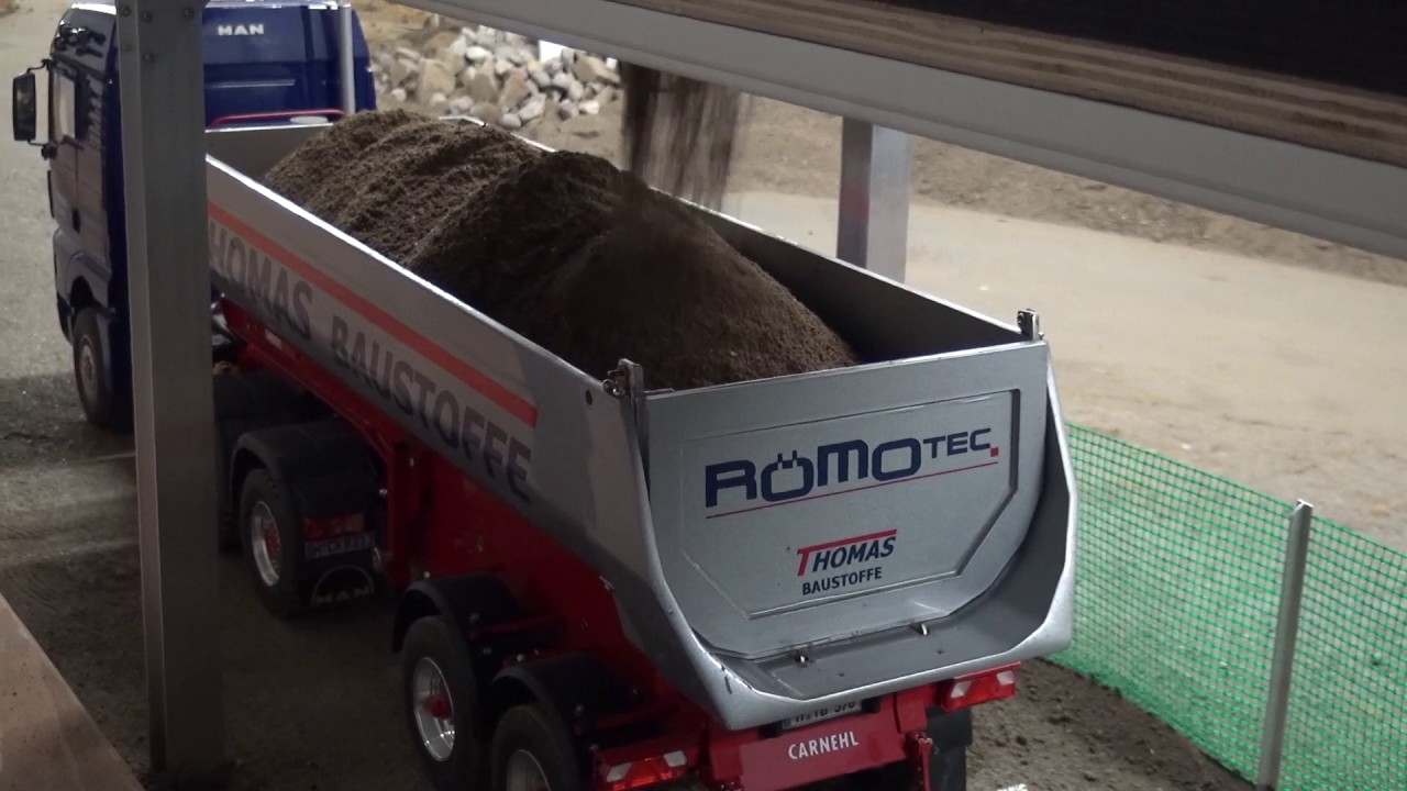 MAN Truck filling at the silo - YouTube