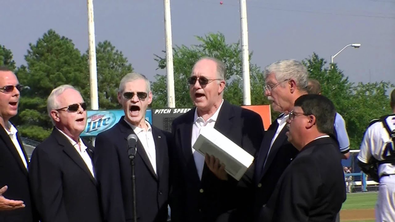 The Holidays sing the National Anthem at the Norfolk Tides Baseball ...