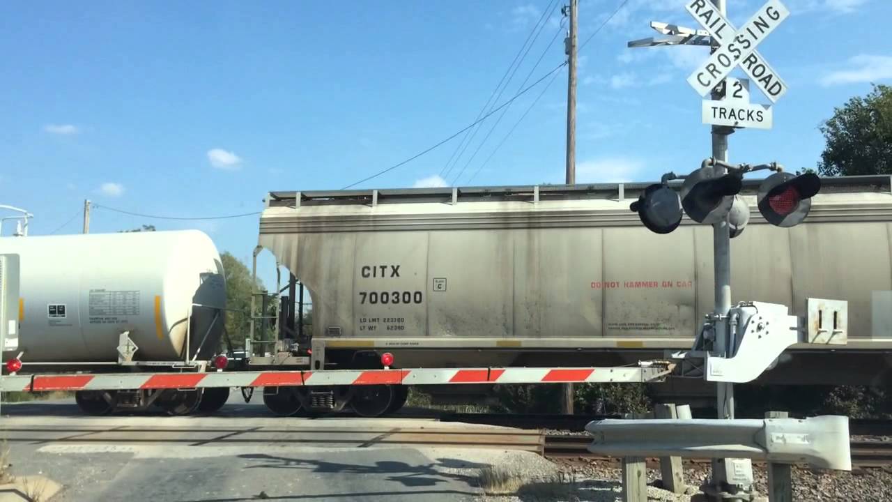 NS #9643 leads NB Mixed Freight with NS Top Hat trailing. Overland Park ...