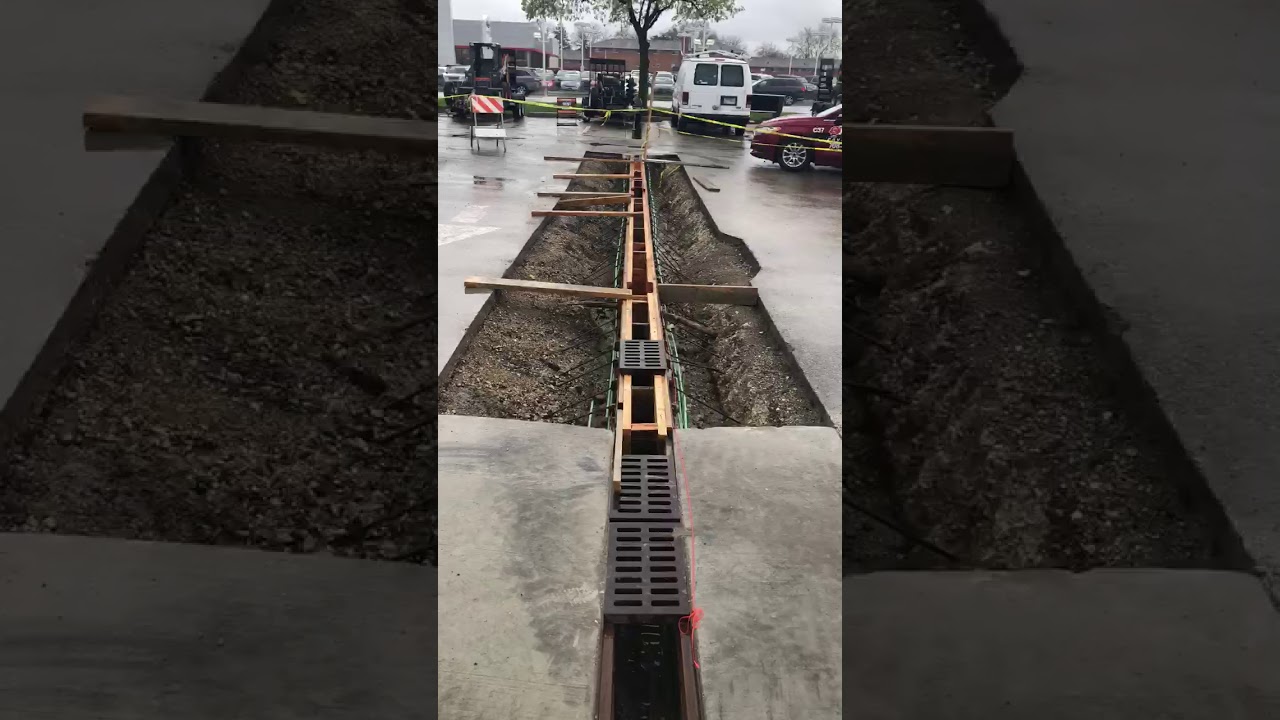 Rose Paving - How to Install a Trench Drain for a Parking Lot Storm ...