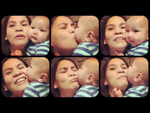 Cute baby kissing Mom