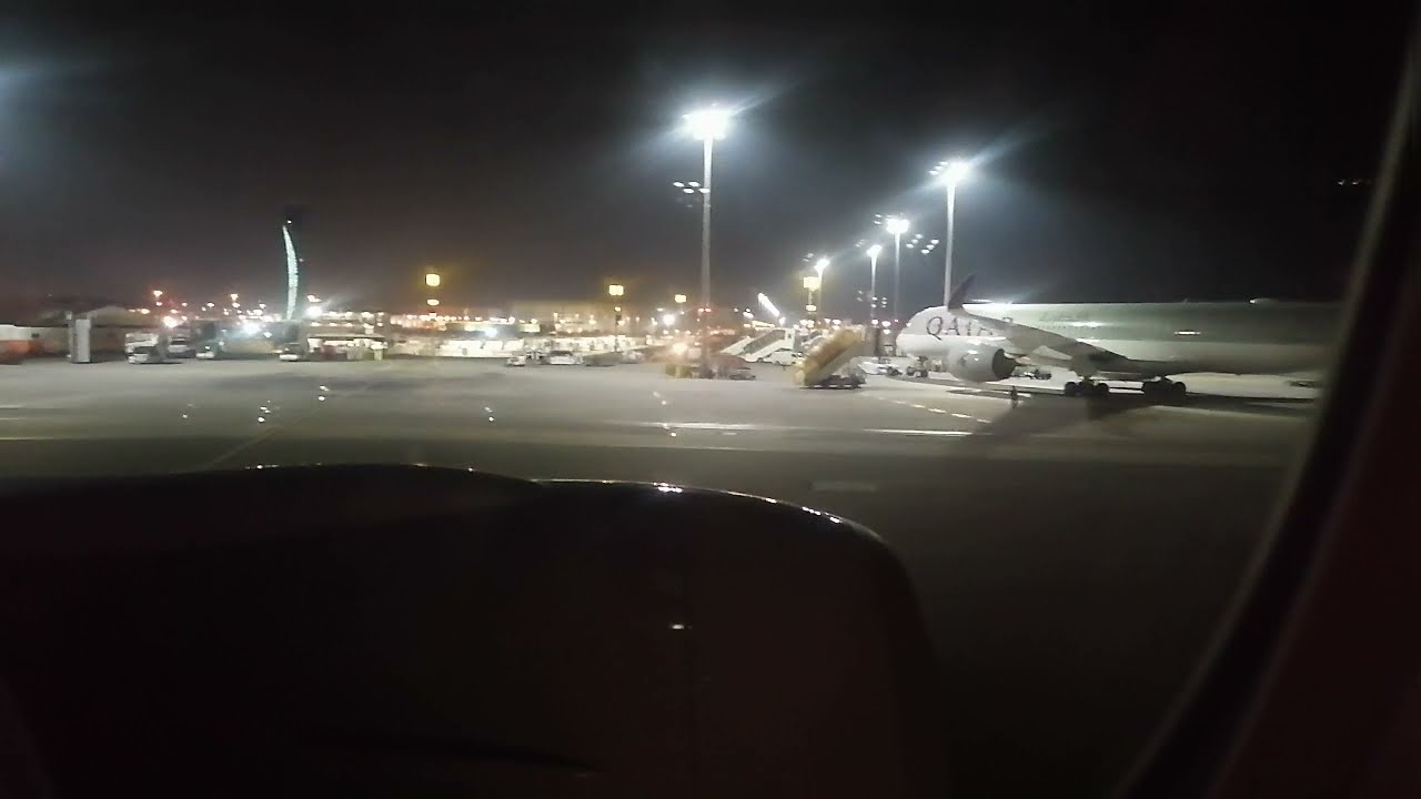 Awesome Airport Night View of Airline Taxiing the runway during night ...