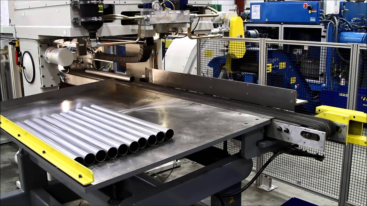 Hautau -Tube Cut Off Lathe- Stacking Exit Conveyor - YouTube