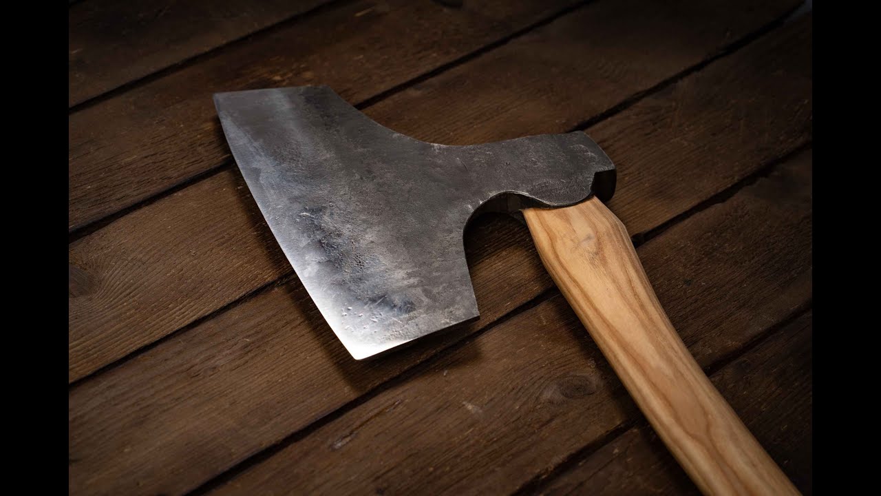 Forging a broad hewing axe - YouTube