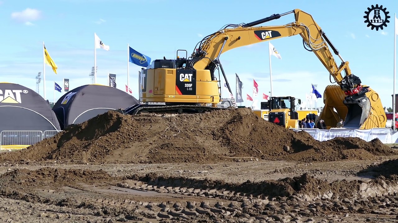 Cat 335F LCR with Rototilt R8 @ Load up North 2015 - YouTube