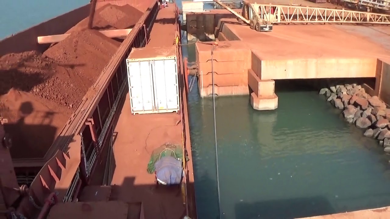 barge alongside loading dock 1 - YouTube