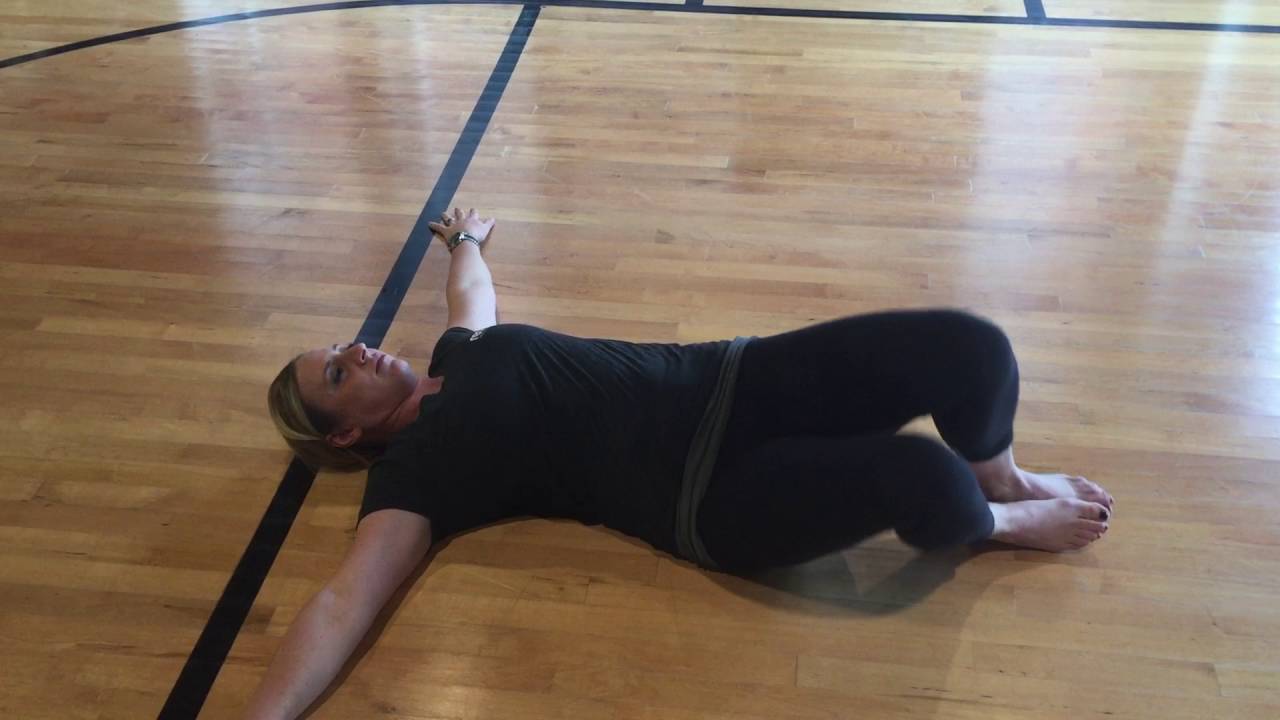 Lumbar rotation stretches - YouTube