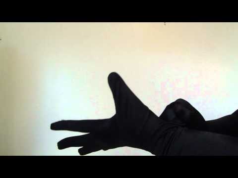 Putting on opera length black gloves
