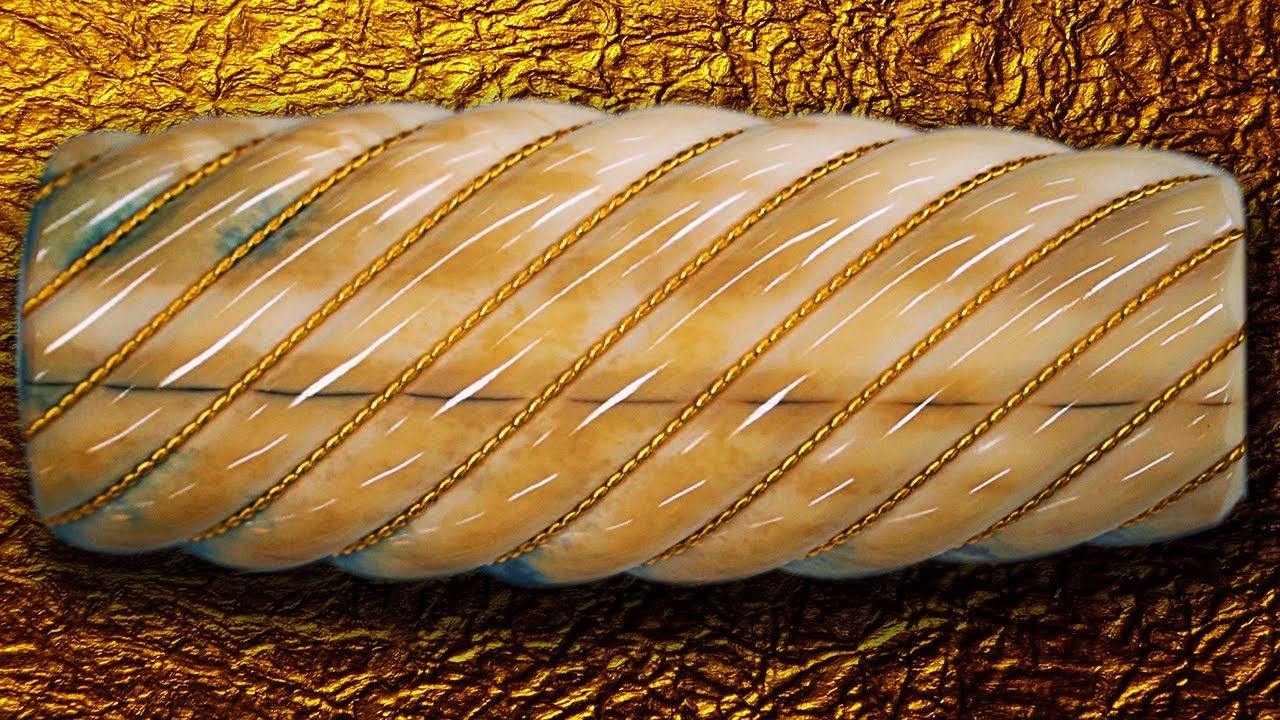 Wrapping One of the Most Beautiful Handles with Gold - YouTube