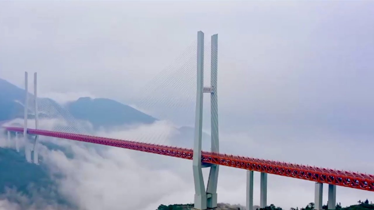 Bridge in SW China rises 200 stories above river - YouTube
