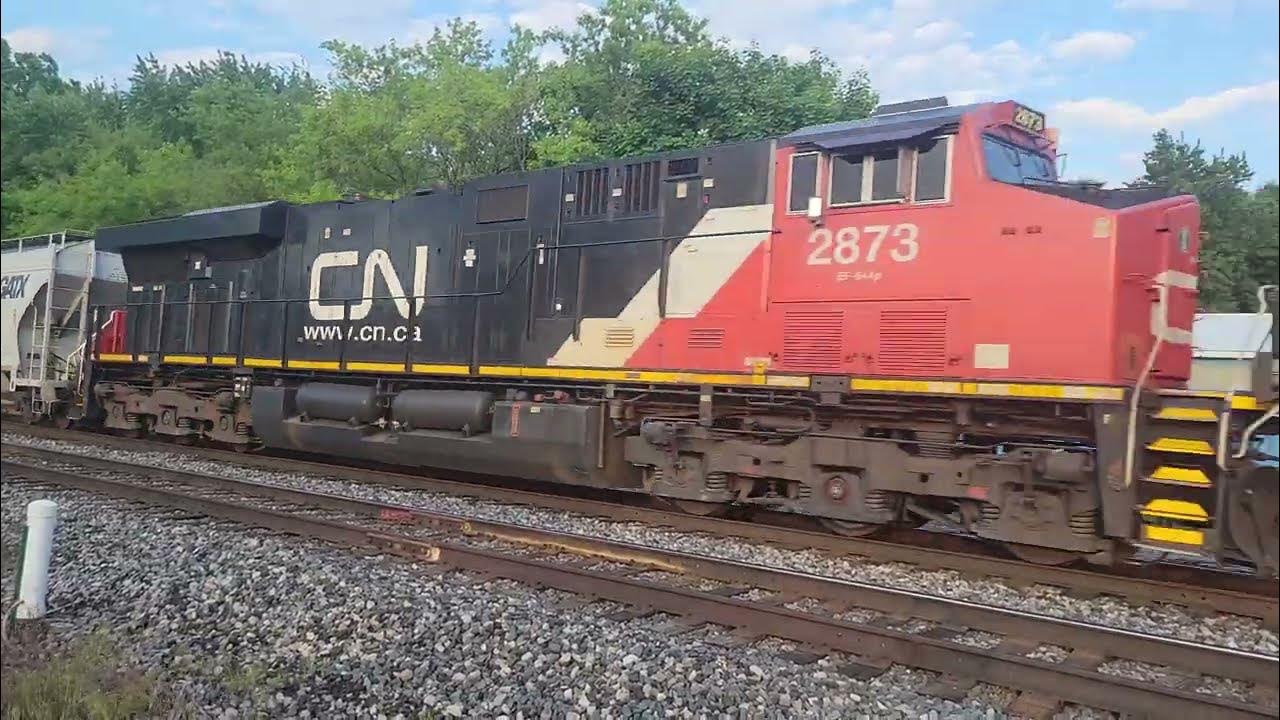 CN 3303, 3002 hauling Eastbound train with SHPX/AGP tank car, CN 2873 DPU at Vicksburg, MI - YouTube