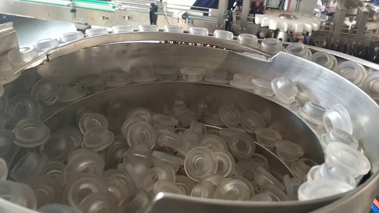 Automatic 2 Head Glass Bottle Filling And Plugging Machine - YouTube