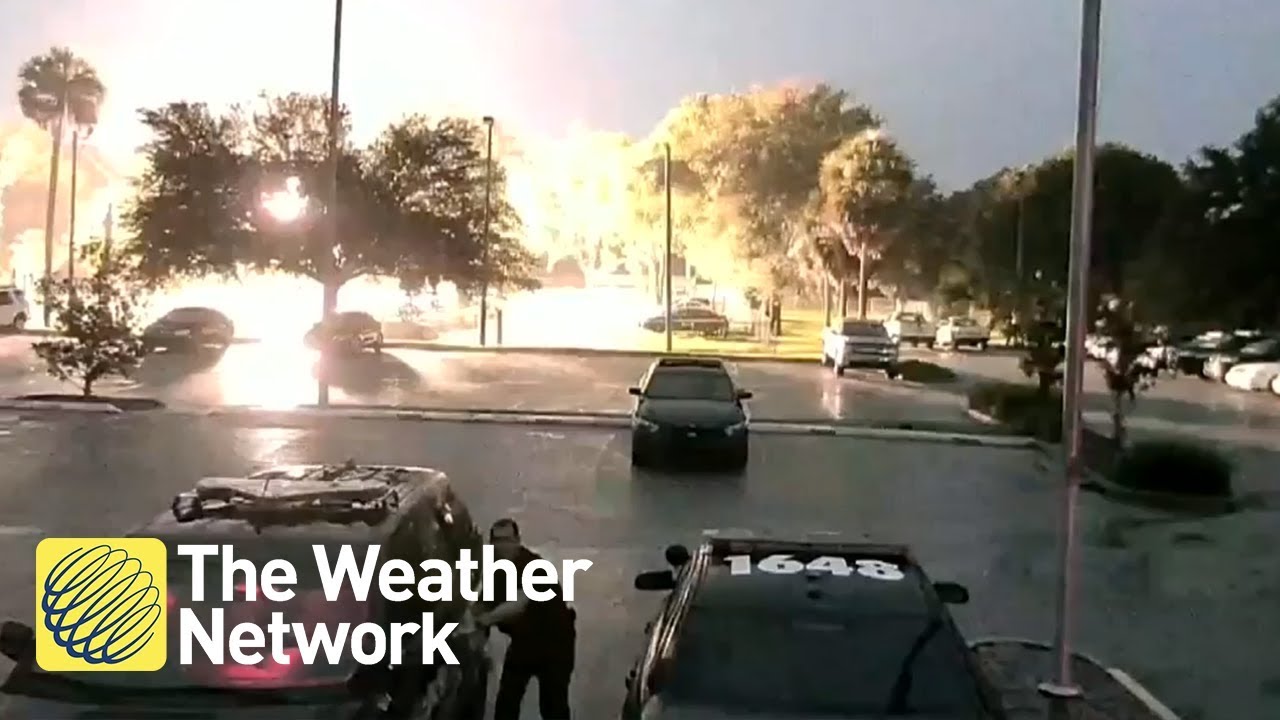 Lightning strikes next to Florida police station, officer scrambles ...