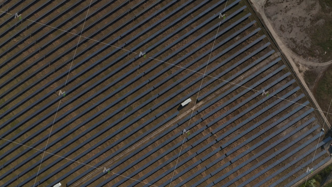 AERIAL: Overhead Birds Eye View of Countless Solar Panels that produce ...