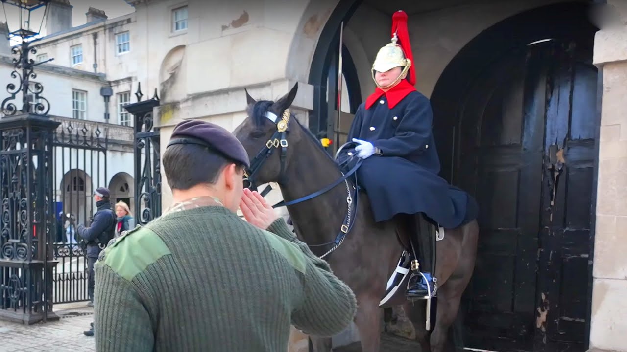 King's Guard carries sword when soldier salutes. - YouTube