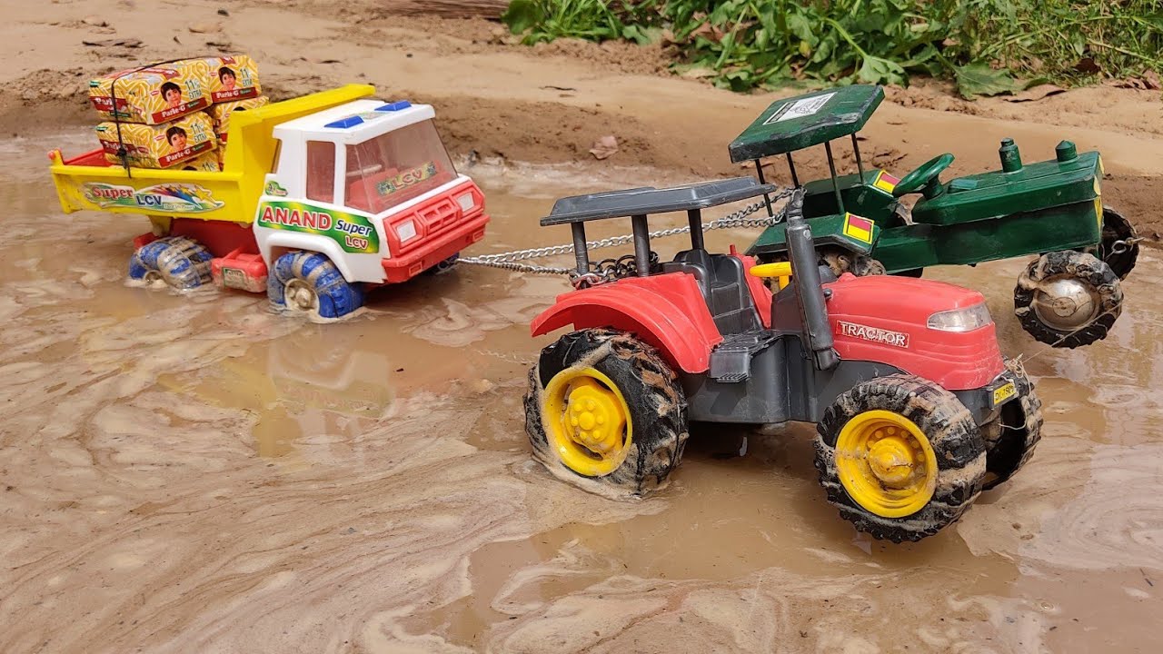 Tata Truck Stuck in Mud Pit Pulling out Mahindra & John deer Tractor ...