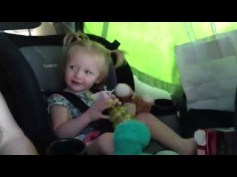 Baby with a squirt bottle
