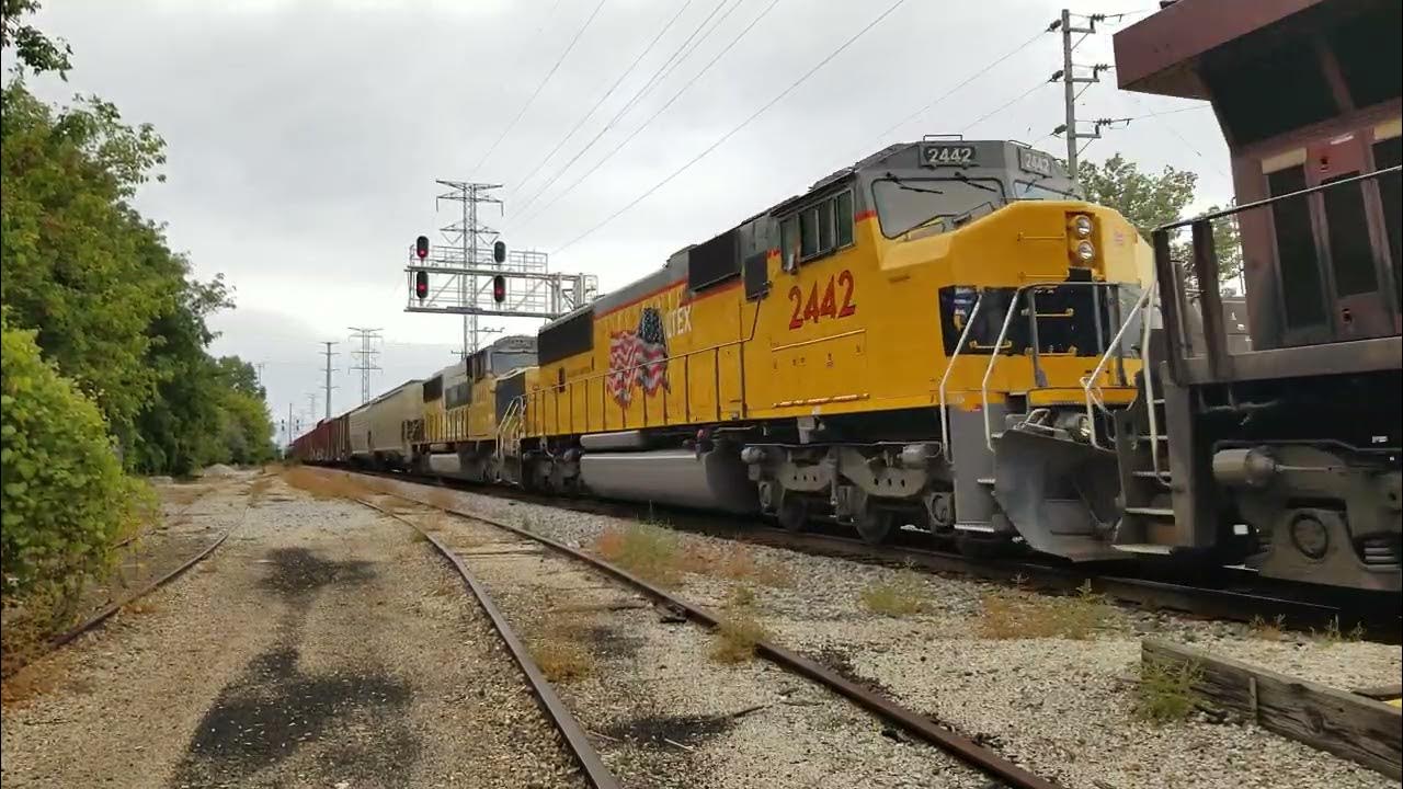 KCS 5008 leads large lashup with LTEX ex-UP SD60Ms on CPKC 247 at Morton Grove - YouTube