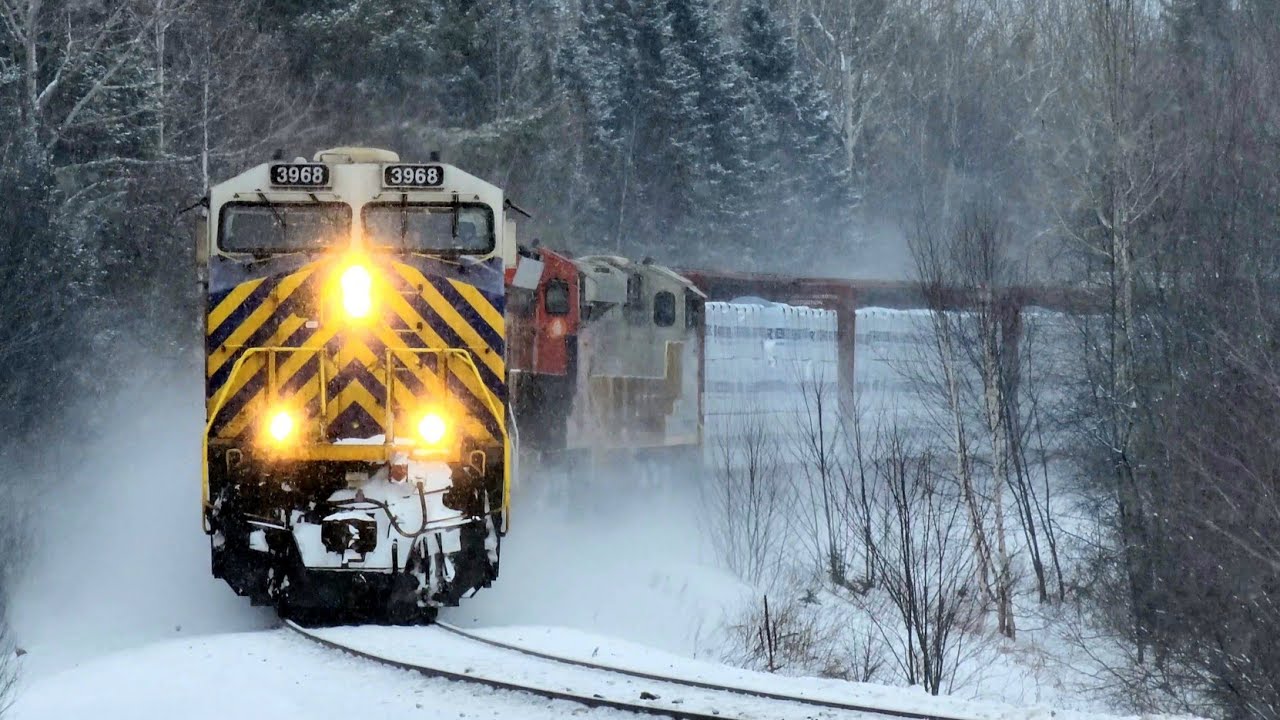 WINTER WONDERLAND! As Manifest Train CN 305 Heads Through Chipman - YouTube