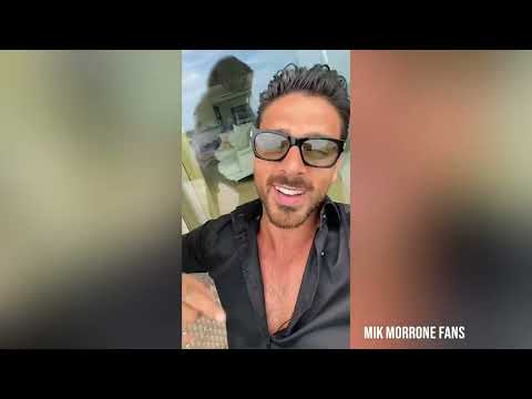 Michele Morrone and Magdalena Lamparska listening to \