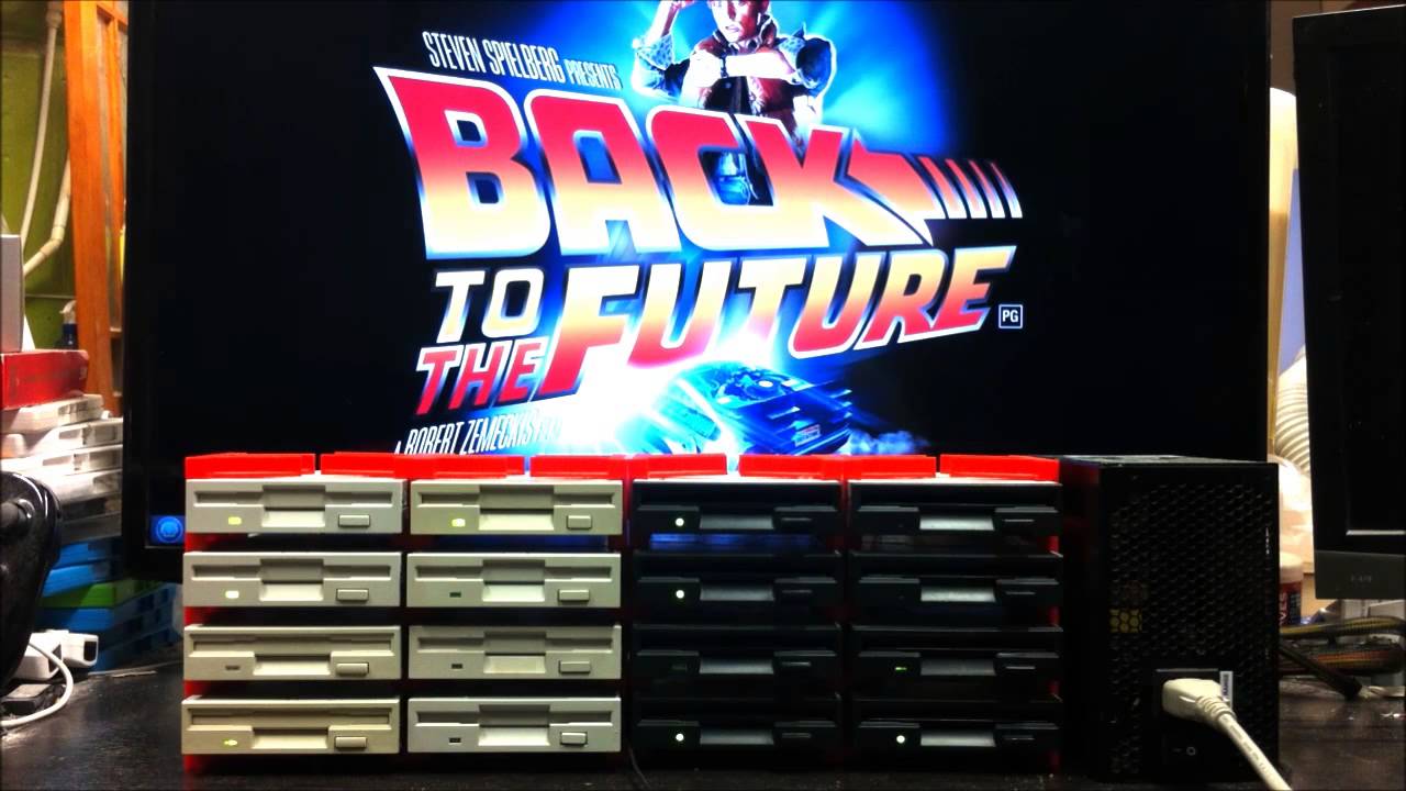 Back To The Future Theme on 16 Floppy drives With Improved Audio - YouTube