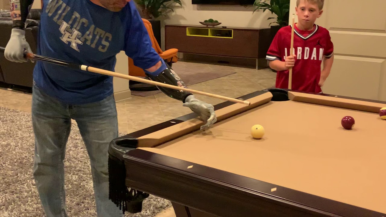 Bilateral arm amputee playing pool - YouTube