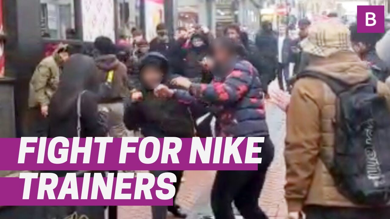Fight erupts in queue for limited edition Nike trainers - YouTube