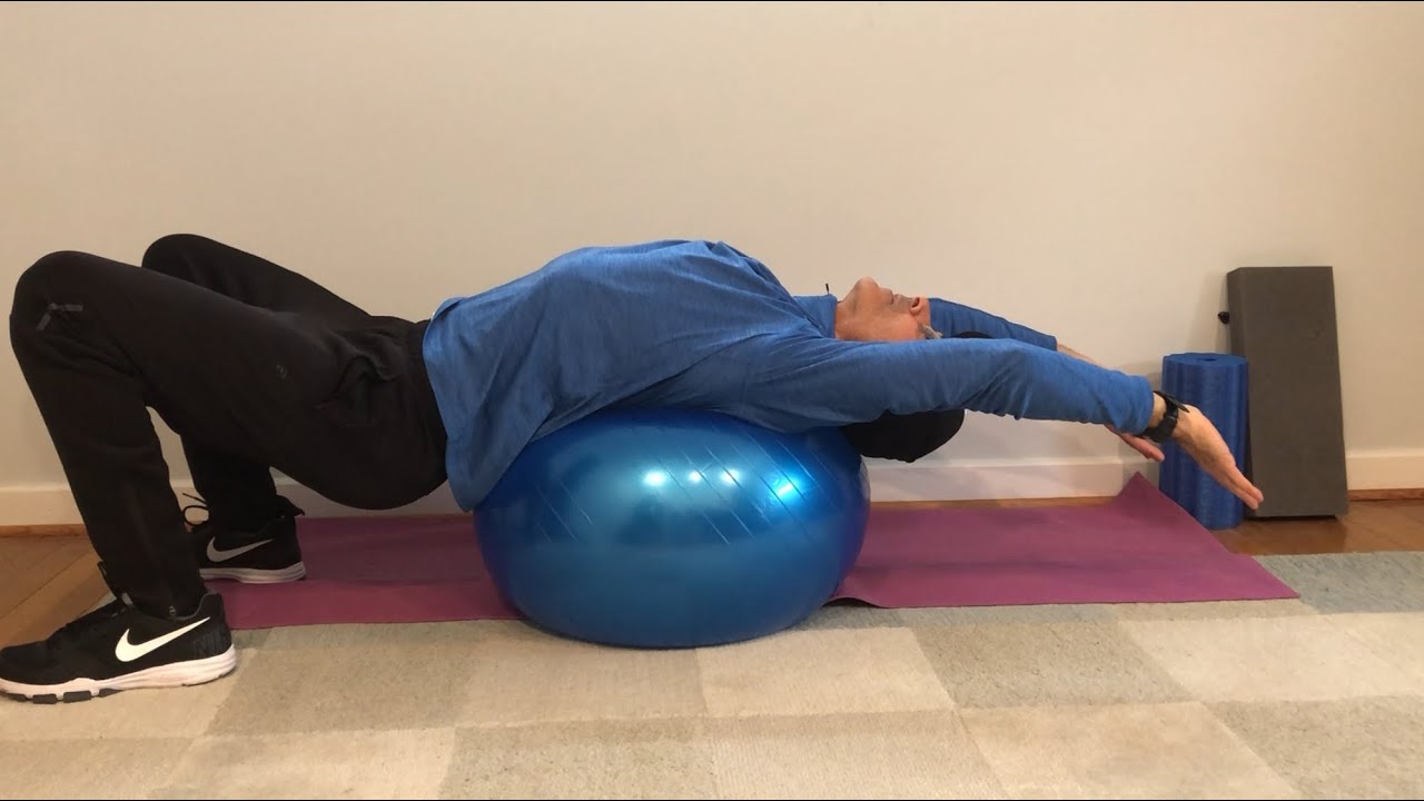 How To Perform The Thoracic Extension Stretch On The Exercise Ball ...