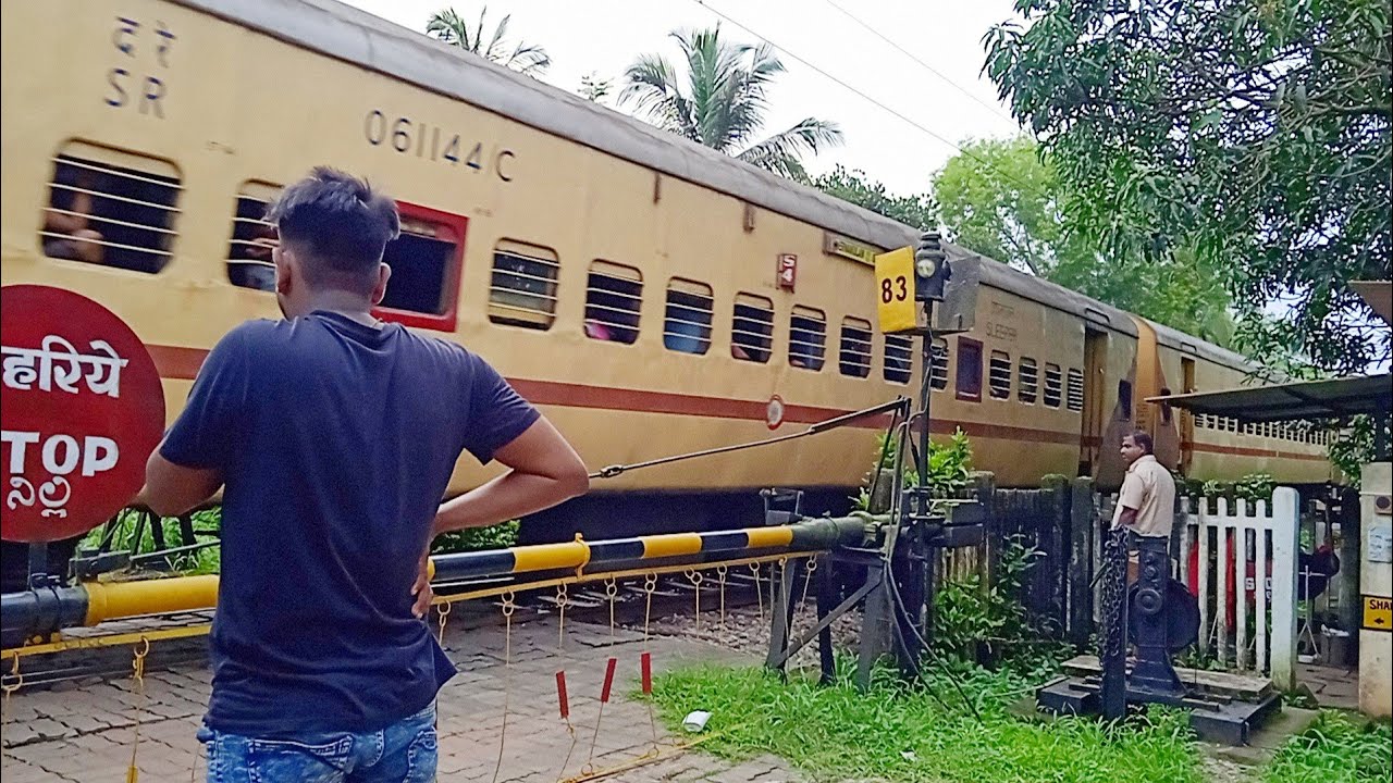 OKha Ernakulam Express Accelerates At Railroad Level Crossing - YouTube
