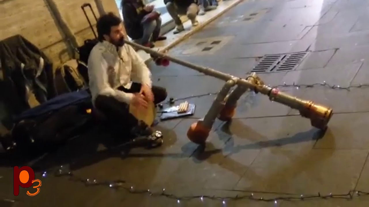 Street Musician - Guy playing pipes in the streets of the world. - YouTube