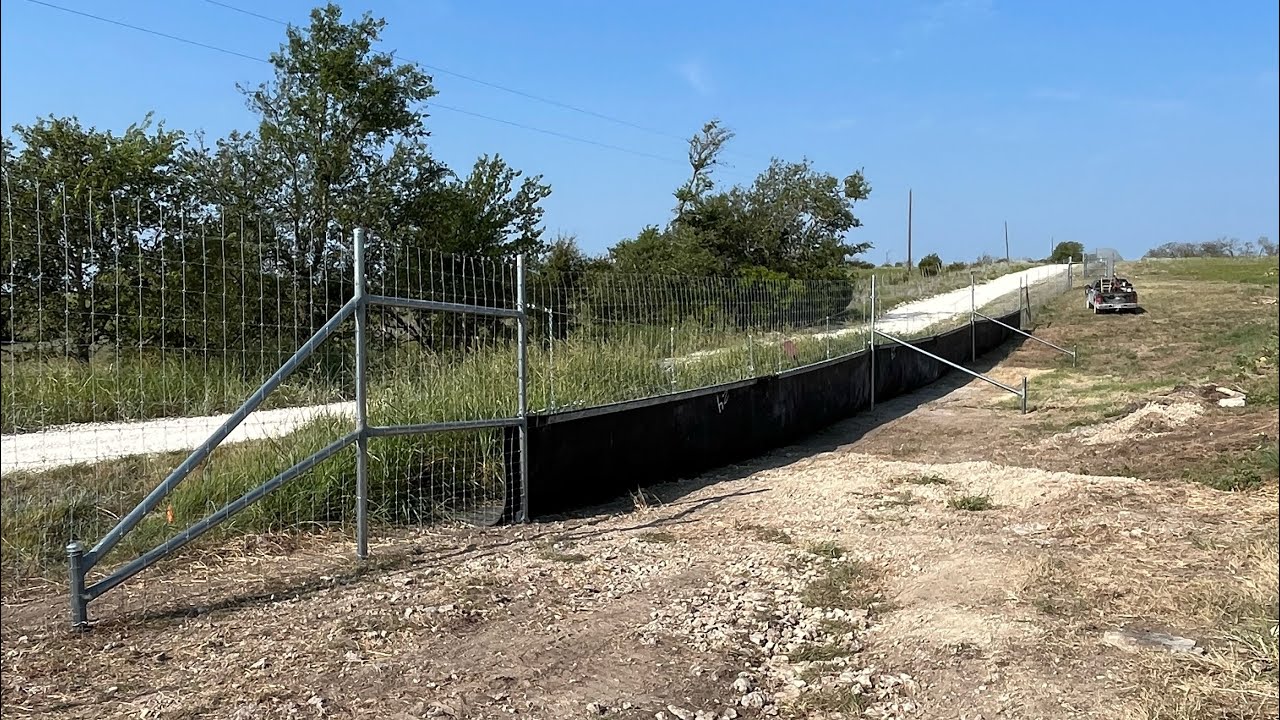 Game fence water gap installation - YouTube