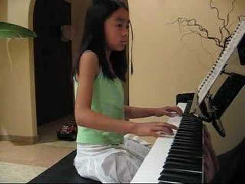 Sandra plays piano in 2006 - YouTube