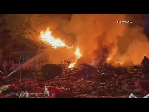 Firefighters rescue man trapped under rubble after house explosion ...
