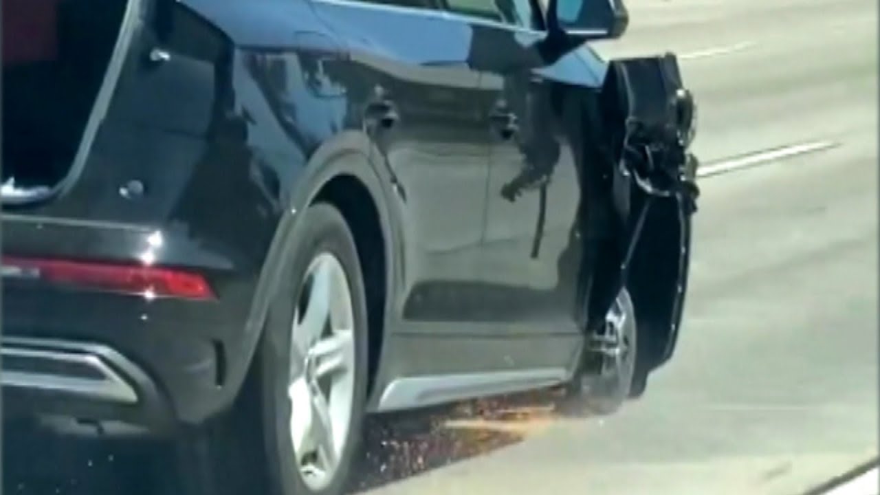 Car Tears Down Freeway on 3 Wheels With Open Tailgate - YouTube