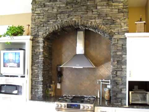 Aztec Masonry & Landscaping fireplace, over the range arch - YouTube