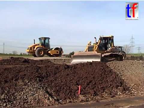 Komatsu 65PX, CAT CP563E, Dump Trucks Dumping,... / B 295, Leonberg ...