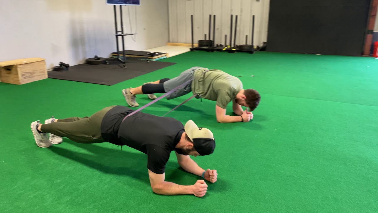Partner Resisted Banded Plank - YouTube