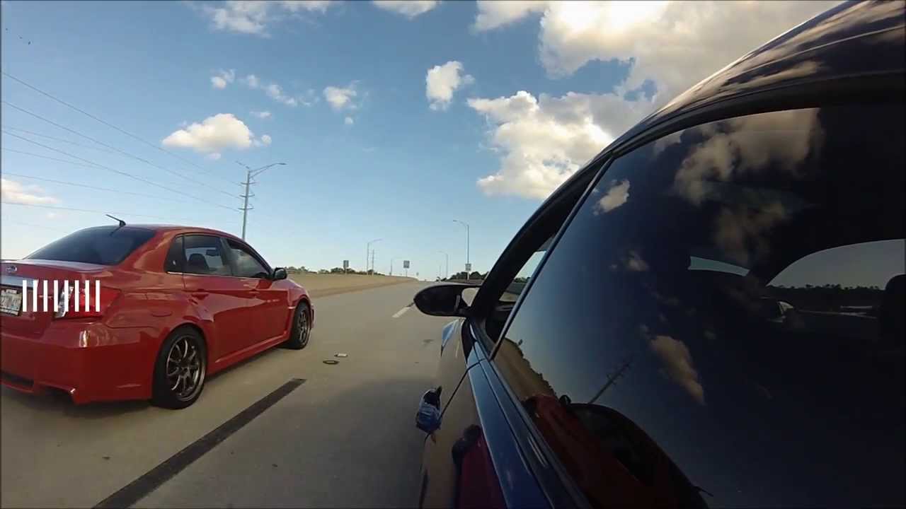 BMW E92 M3 vs. Subaru WRX - YouTube