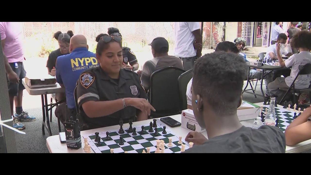 Chess tournament in Harlem bridges gap between youth and NYPD - YouTube