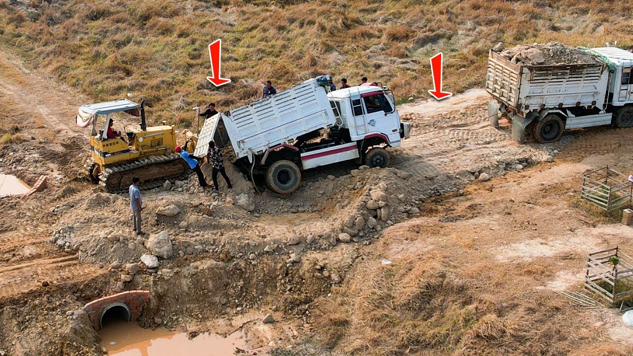 Wonderful Extreme Power: Komatsu Dozer D31A Making New Road with Dump ...