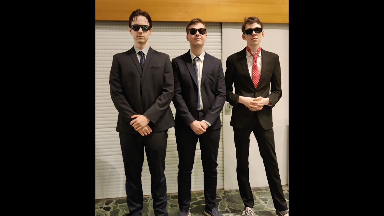 Fast 3BLD solves in a suit - YouTube