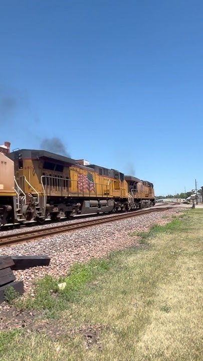 UP 5523 leads eastbound with a Smokey AC44 #train - YouTube