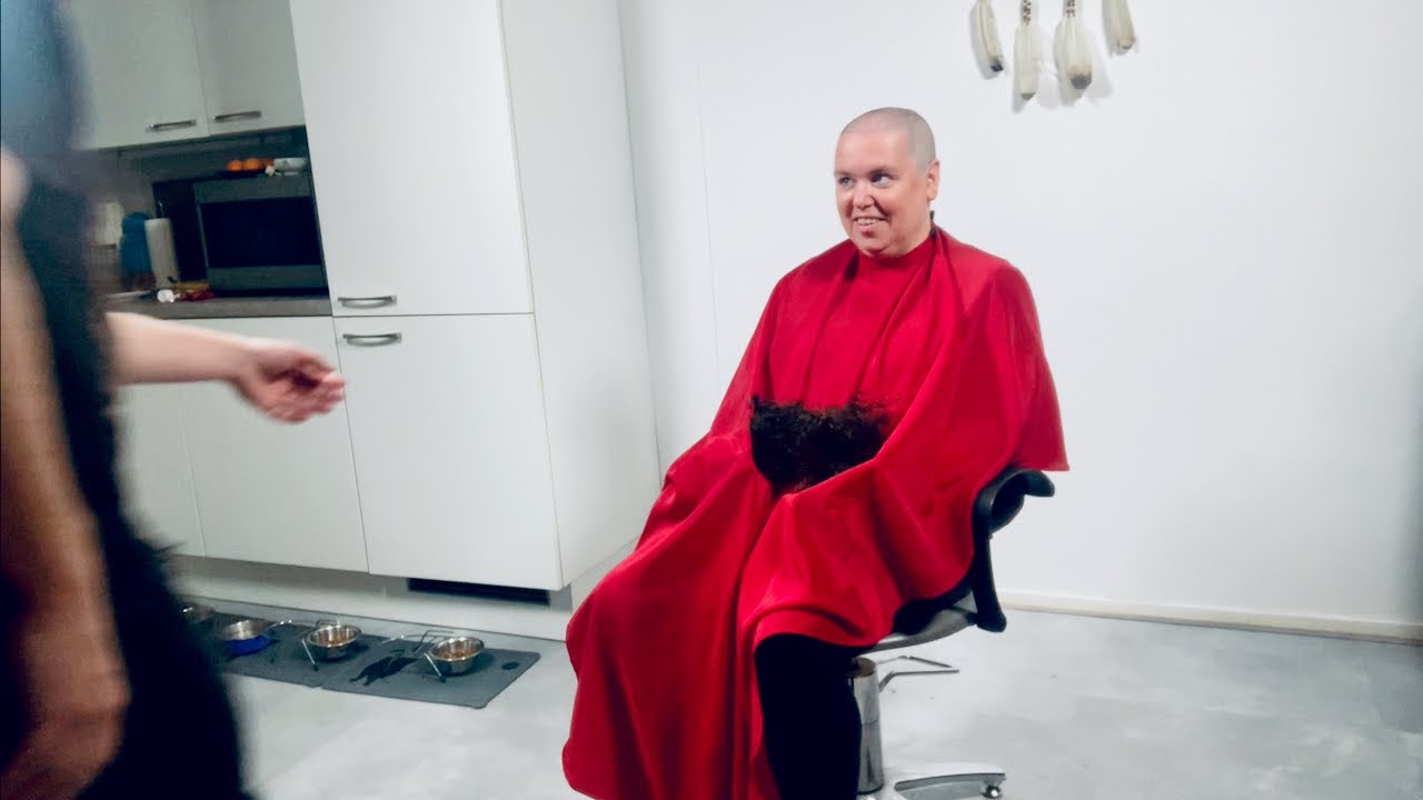 Haircut? Shaving her head bald? This girl has all her hair shaved off ...