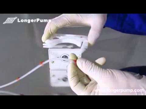 How to load tubing on peristaltic pump head DG - YouTube