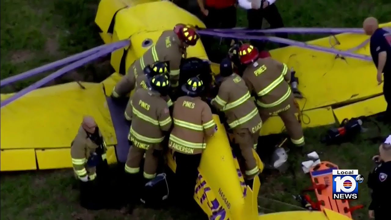 Pilot hurt after banner plane crashes at North Perry Airport - YouTube