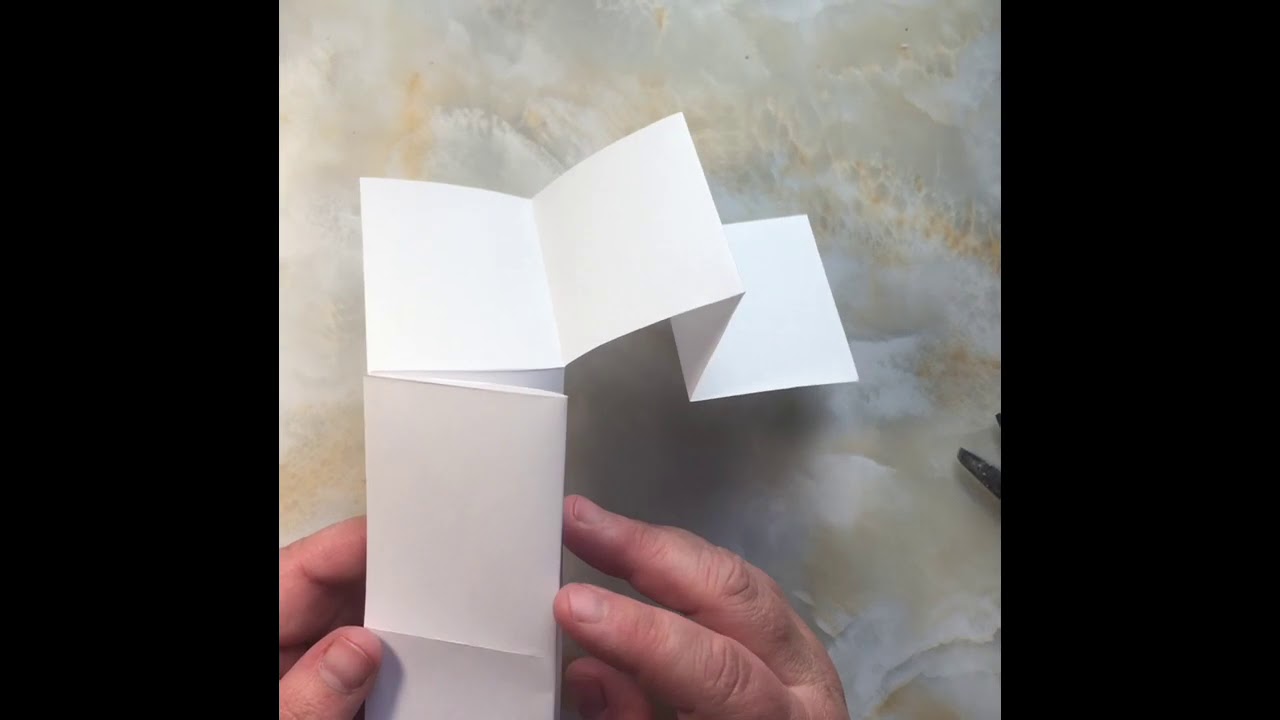 Tiny folded paper books - YouTube