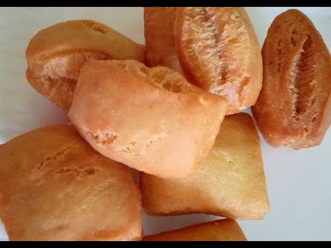 How to make the perfect Crunchy half Cakes Mandazi 😋 - YouTube