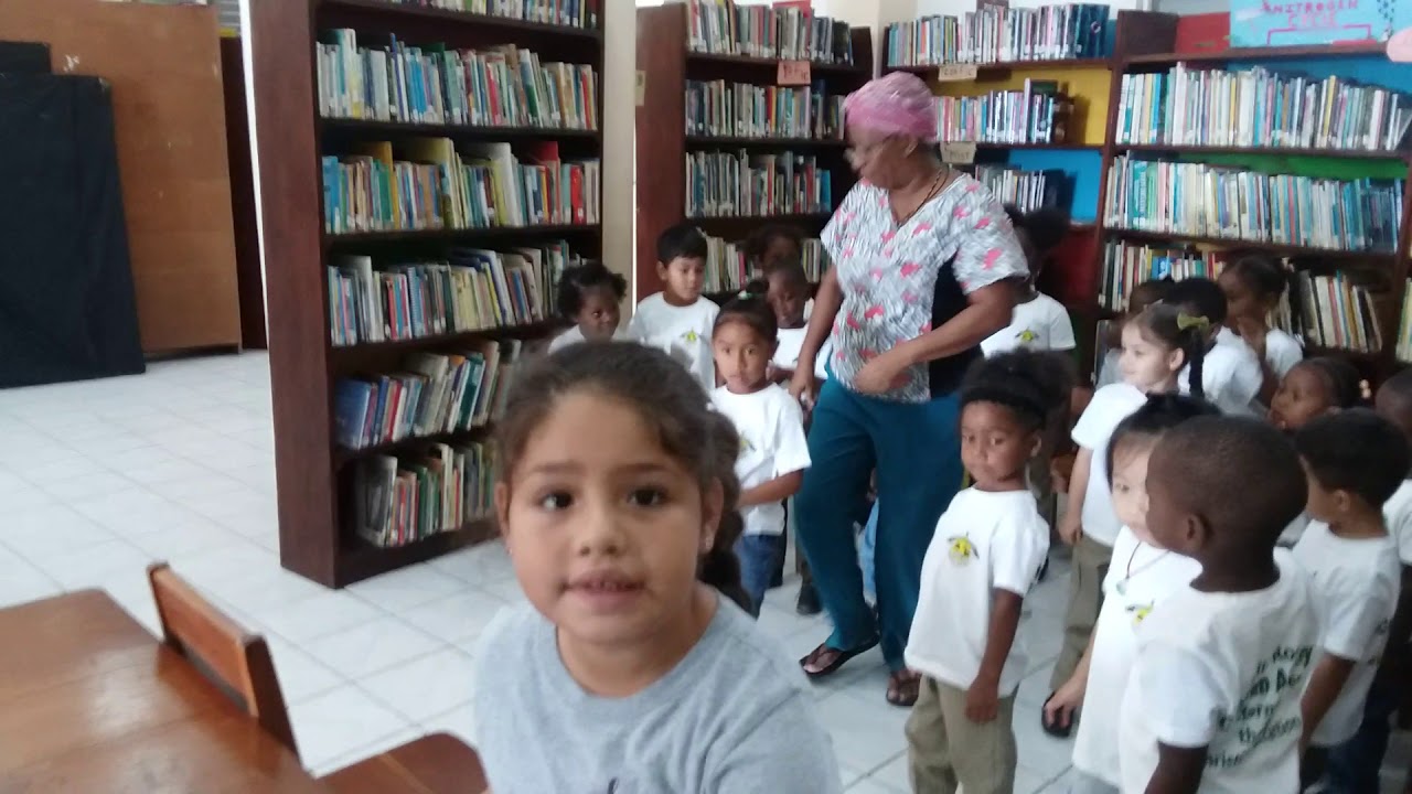 Solid Rock Students at Ignacia Cacho Library - YouTube